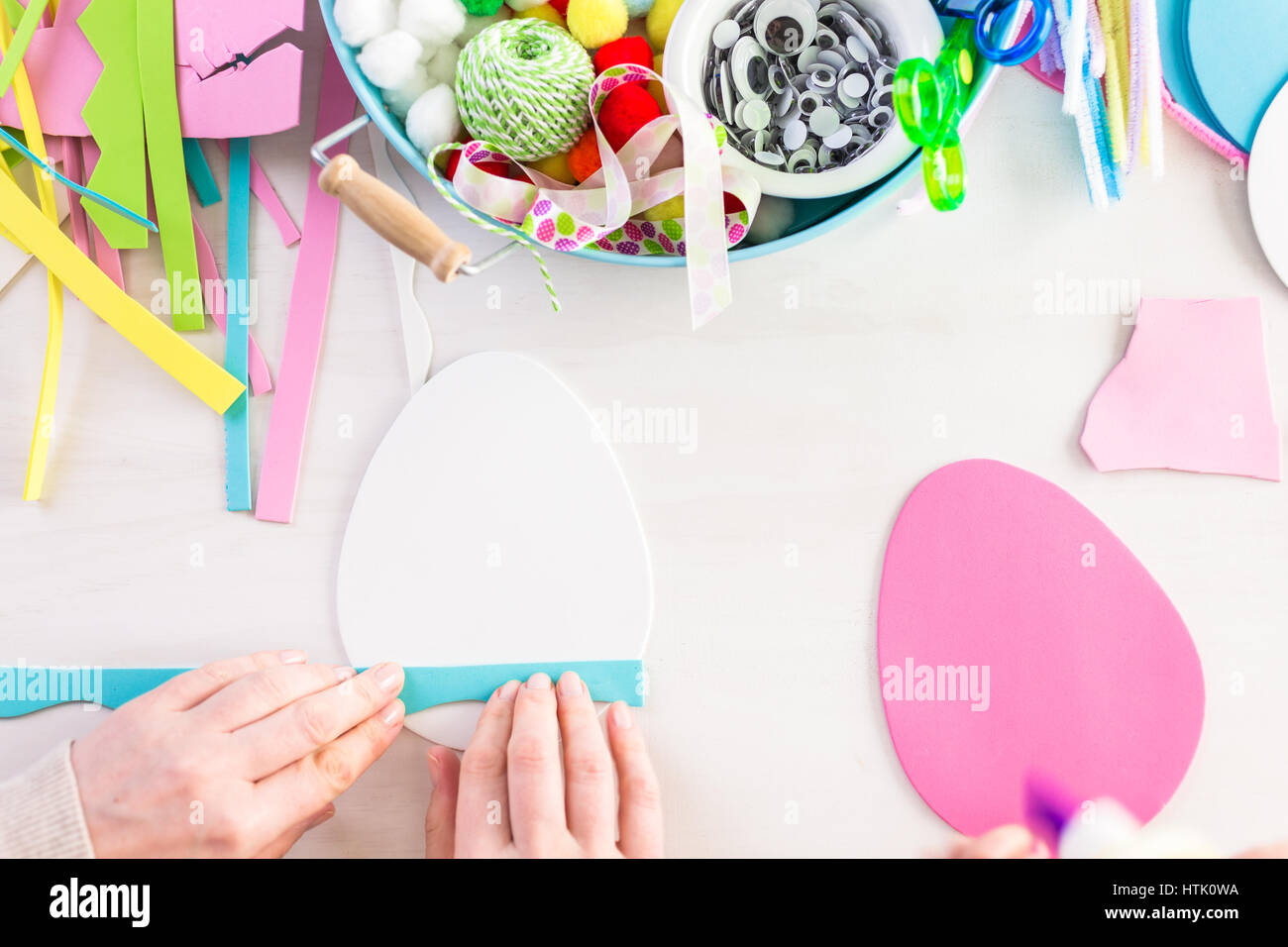 Step by step. Mother and daughter decorating paper Easter eggs Stock ...