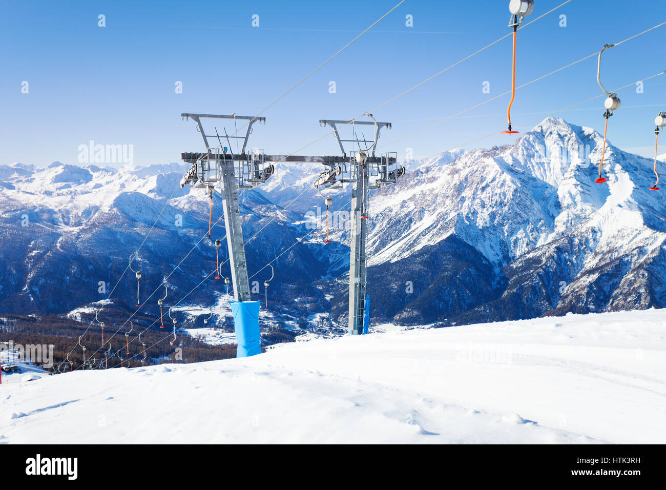 Ski resort with aerial ropeway and button lifts in the midst of ...