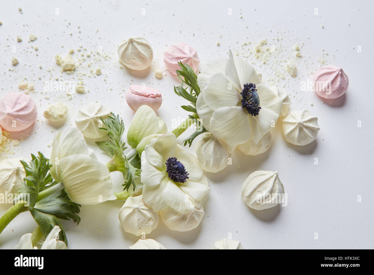 fresh flowers and meringue cookies isolated on white background Stock ...