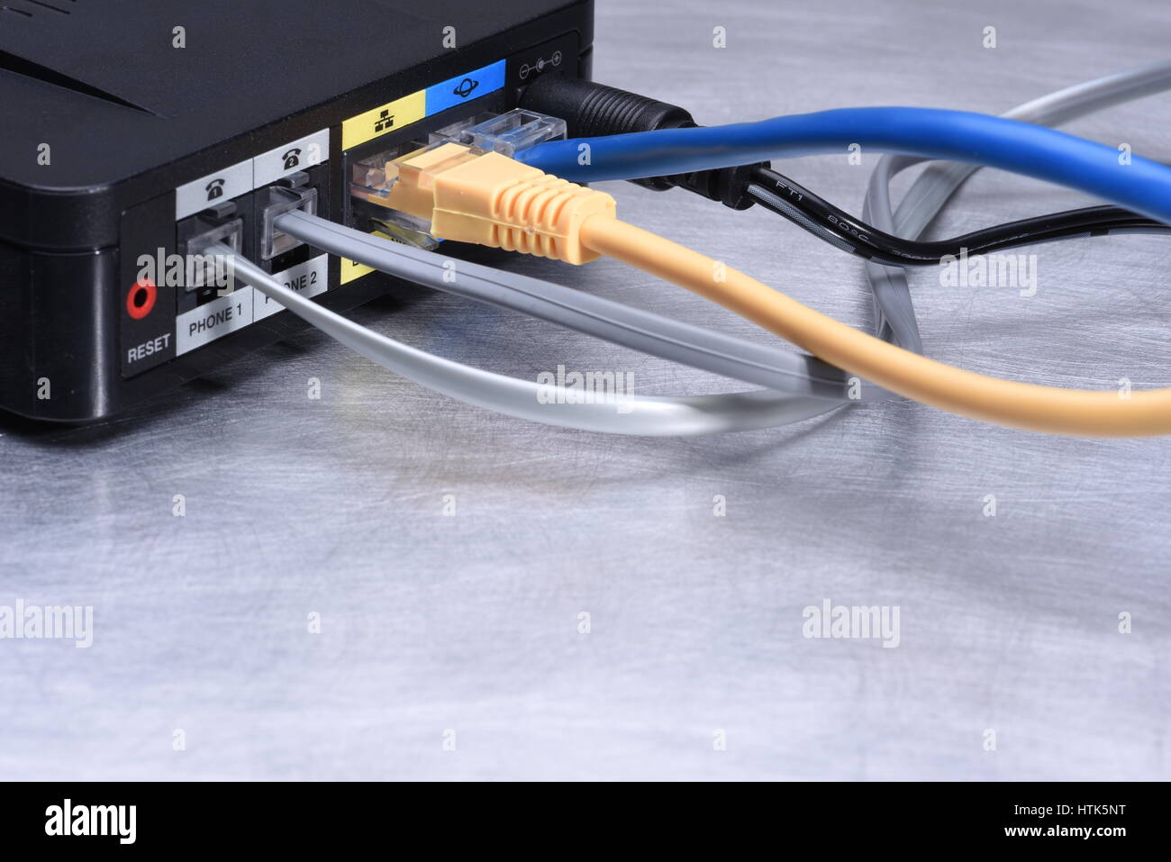Router with Network Line Cables Stock Photo - Alamy