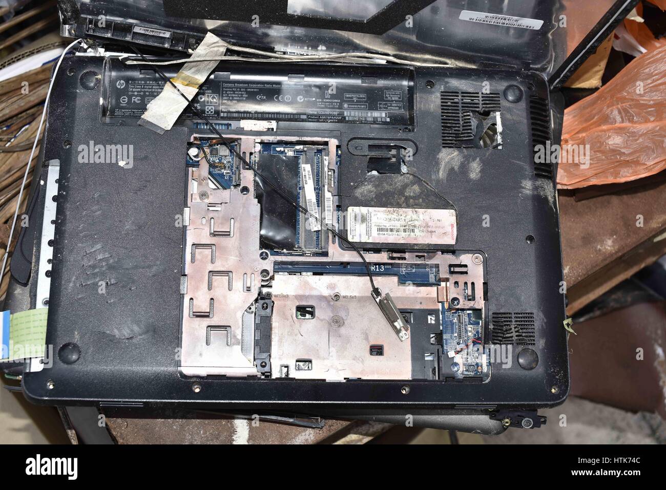 Kuala Lumpur, MALAYSIA. 12th Mar, 2017. Two damaged laptops and one ...