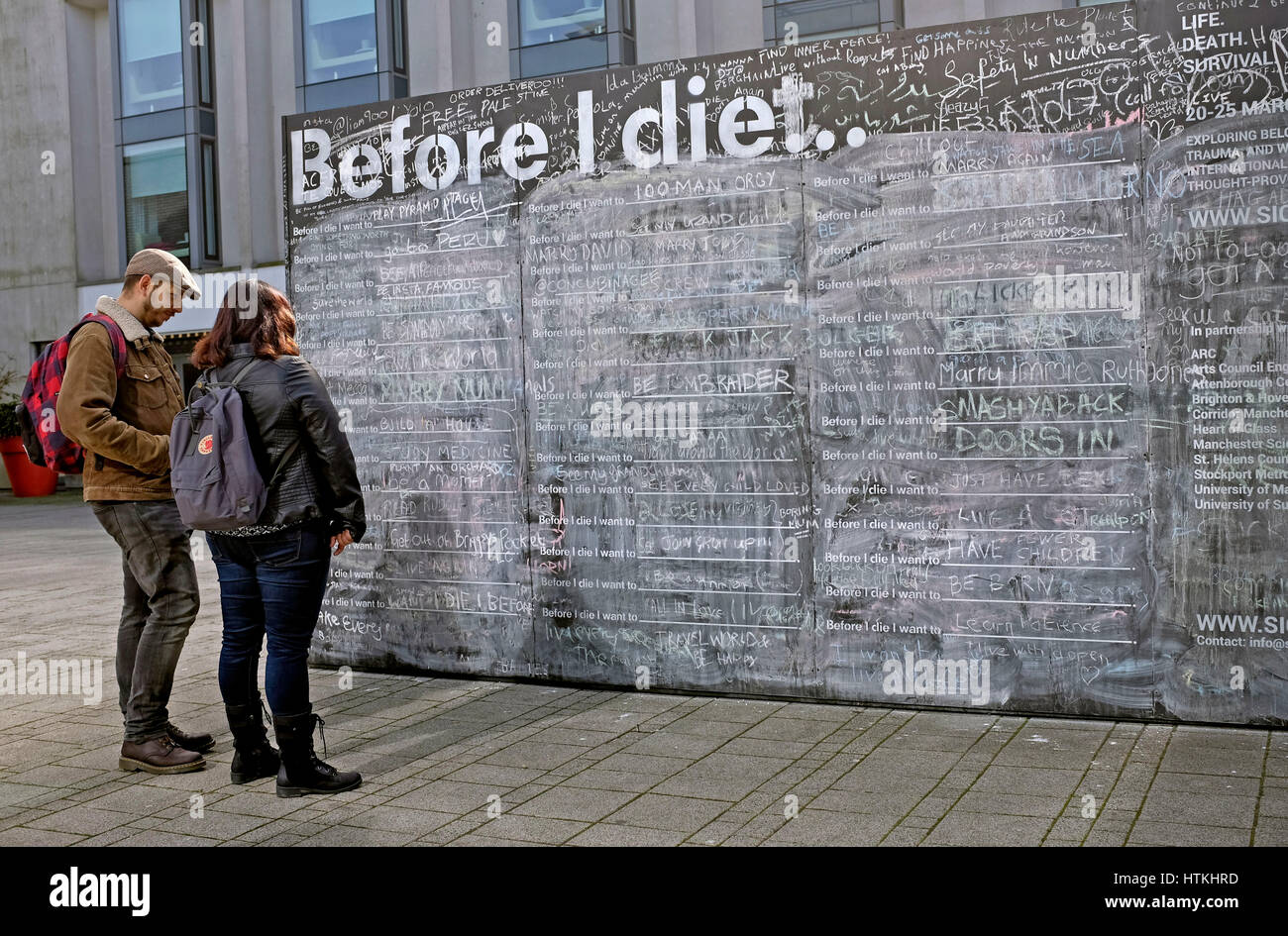 Brighton, UK. 13th Mar, 2017. Visitors enjoy reading the messages on ...