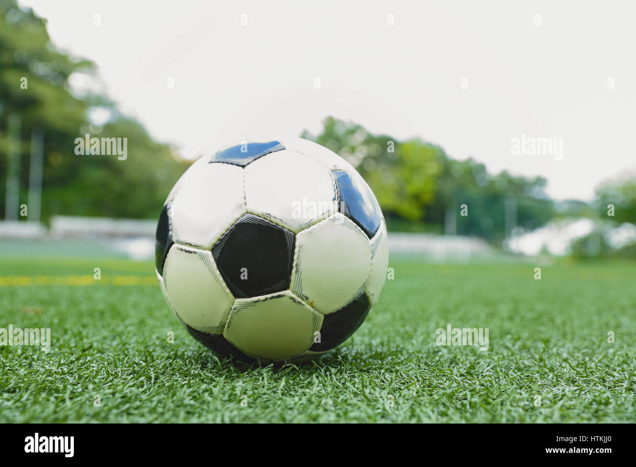 Ball on grass hi-res stock photography and images - Alamy