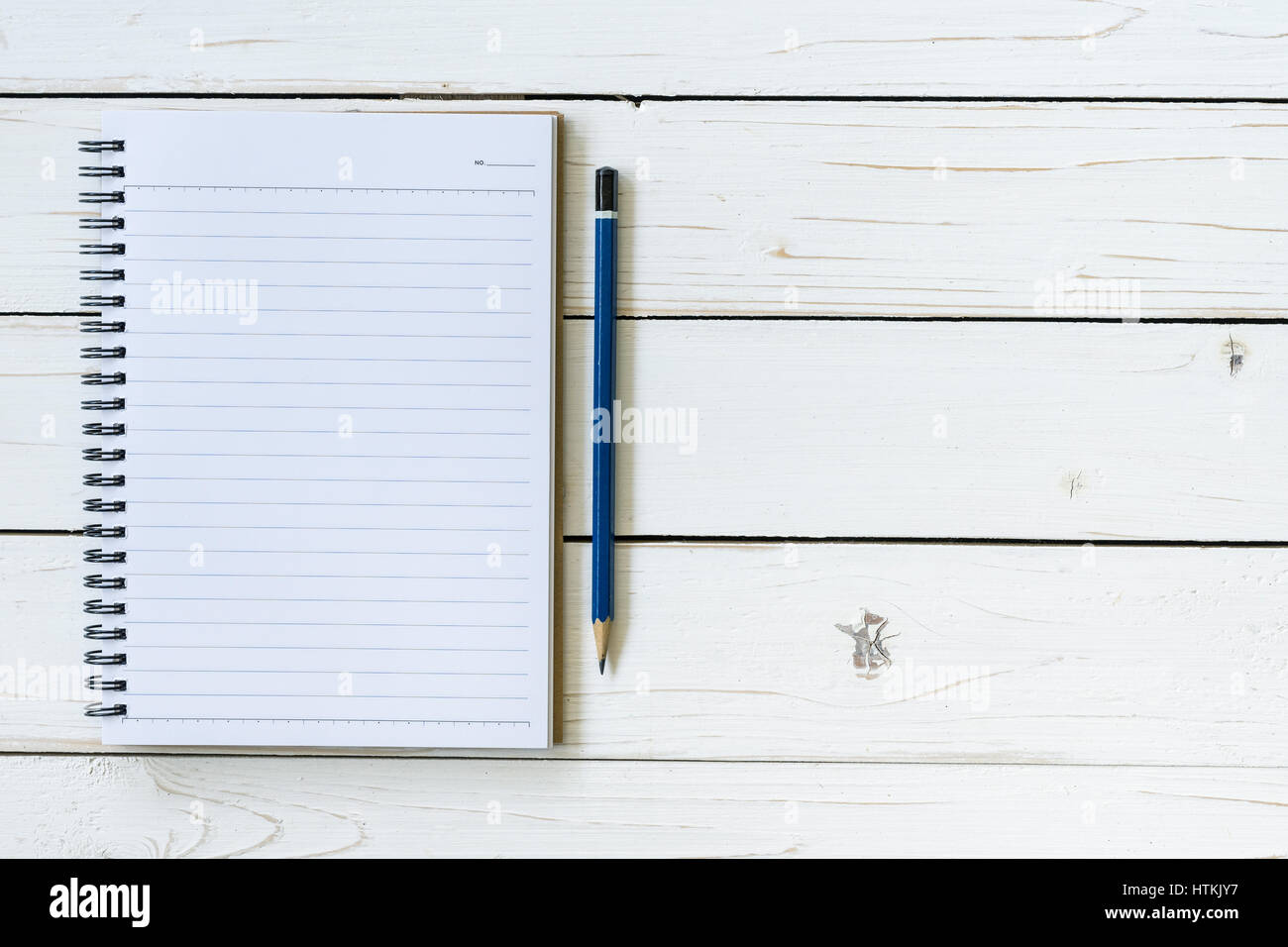 Open notebook with blank pages and pencil Stock Photo - Alamy