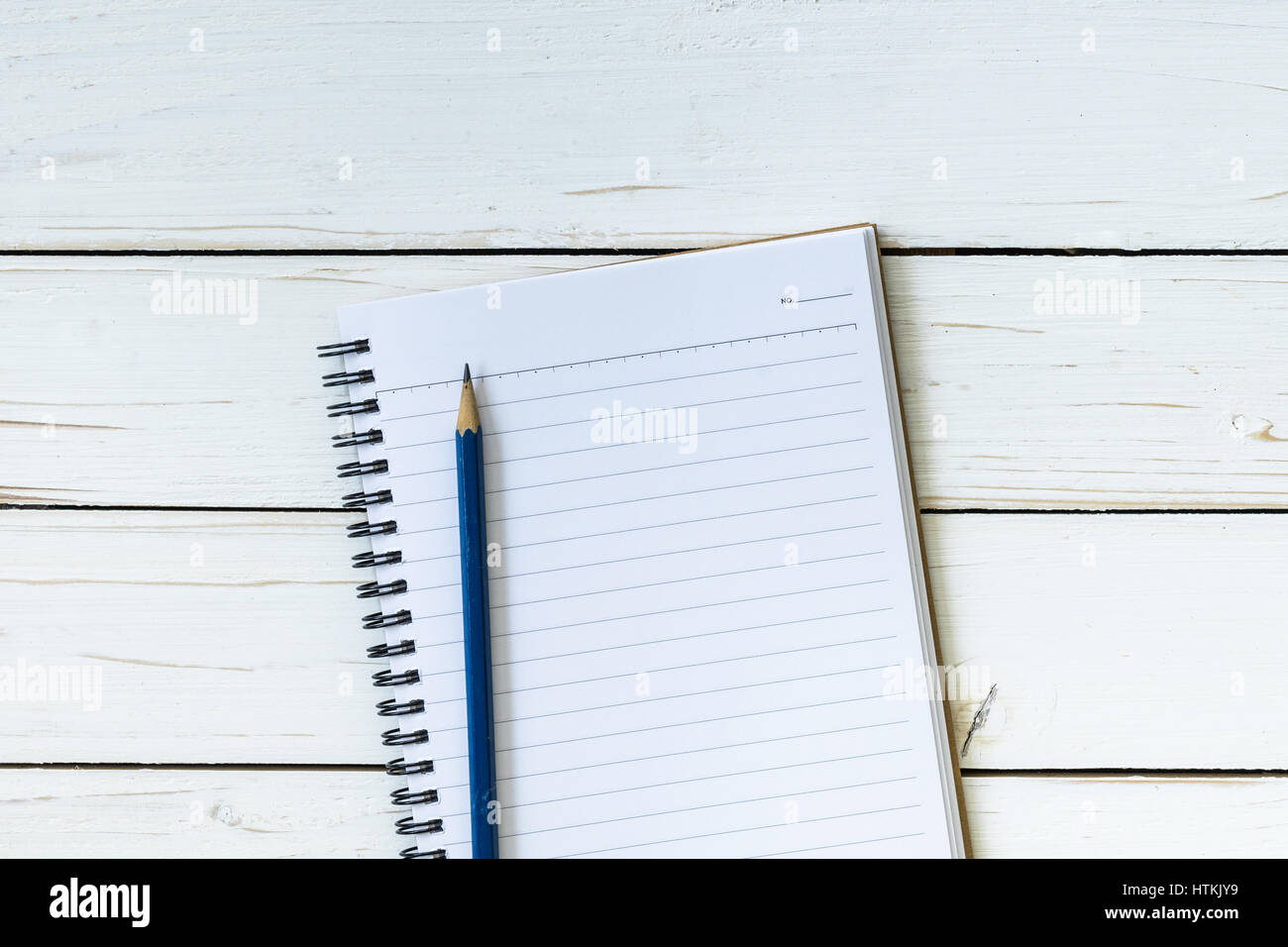 Open notebook with blank pages and pencil Stock Photo - Alamy