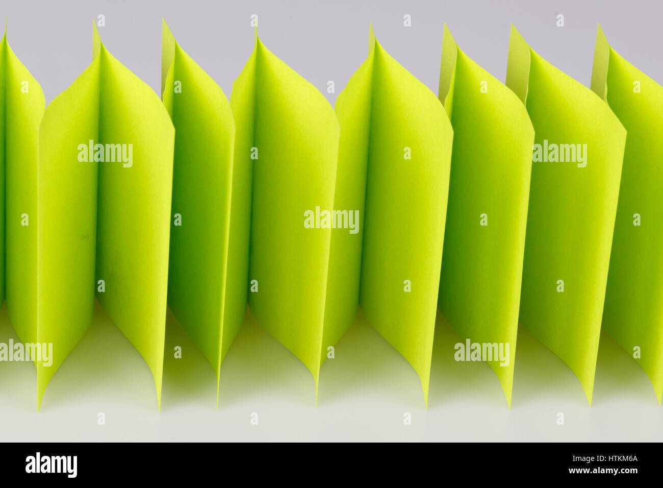 abstract green paper fence on white - sticky notes paper Stock Photo ...