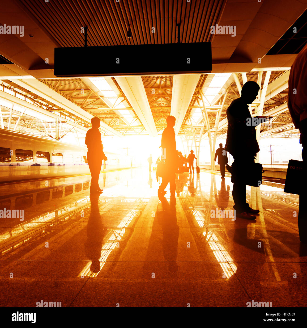 train stop at railway station with sunset Stock Photo - Alamy