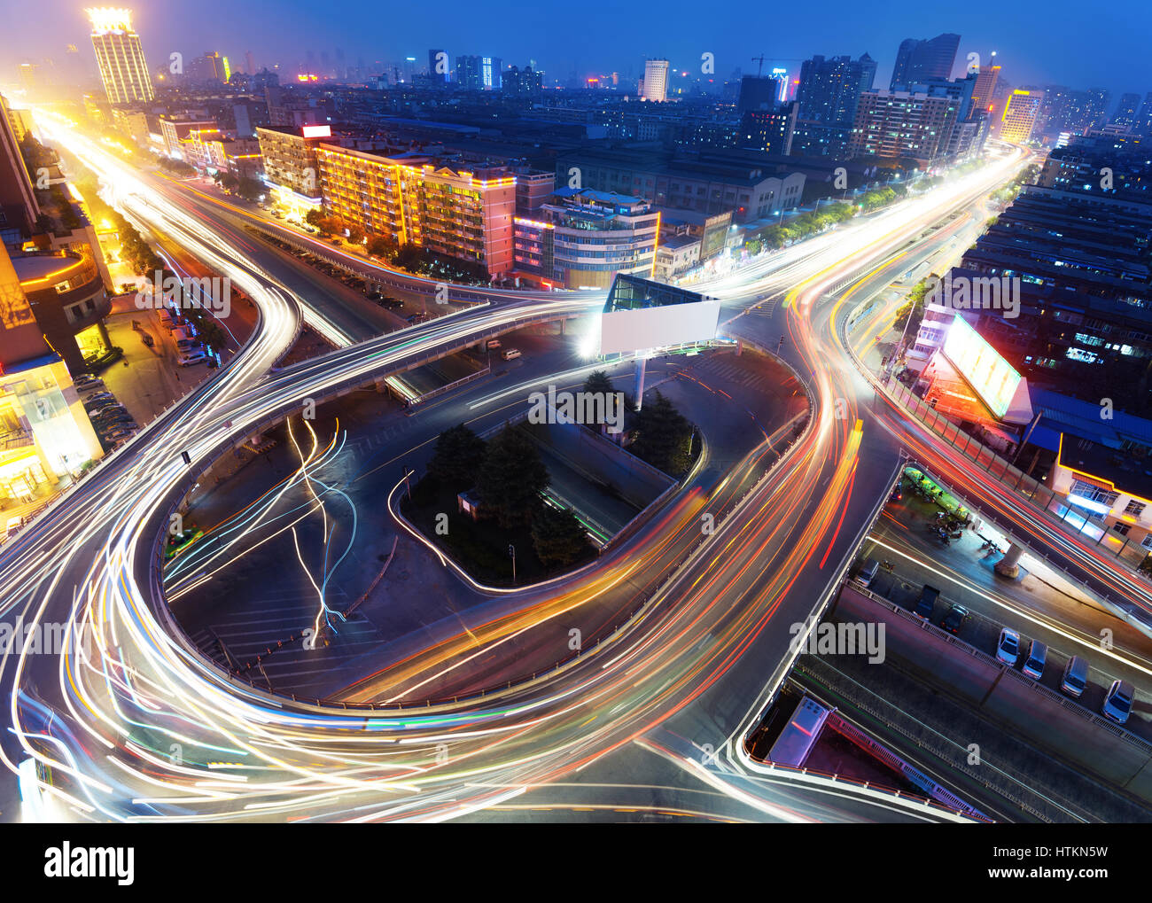 Freeway in night with cars light in modern city Stock Photo - Alamy