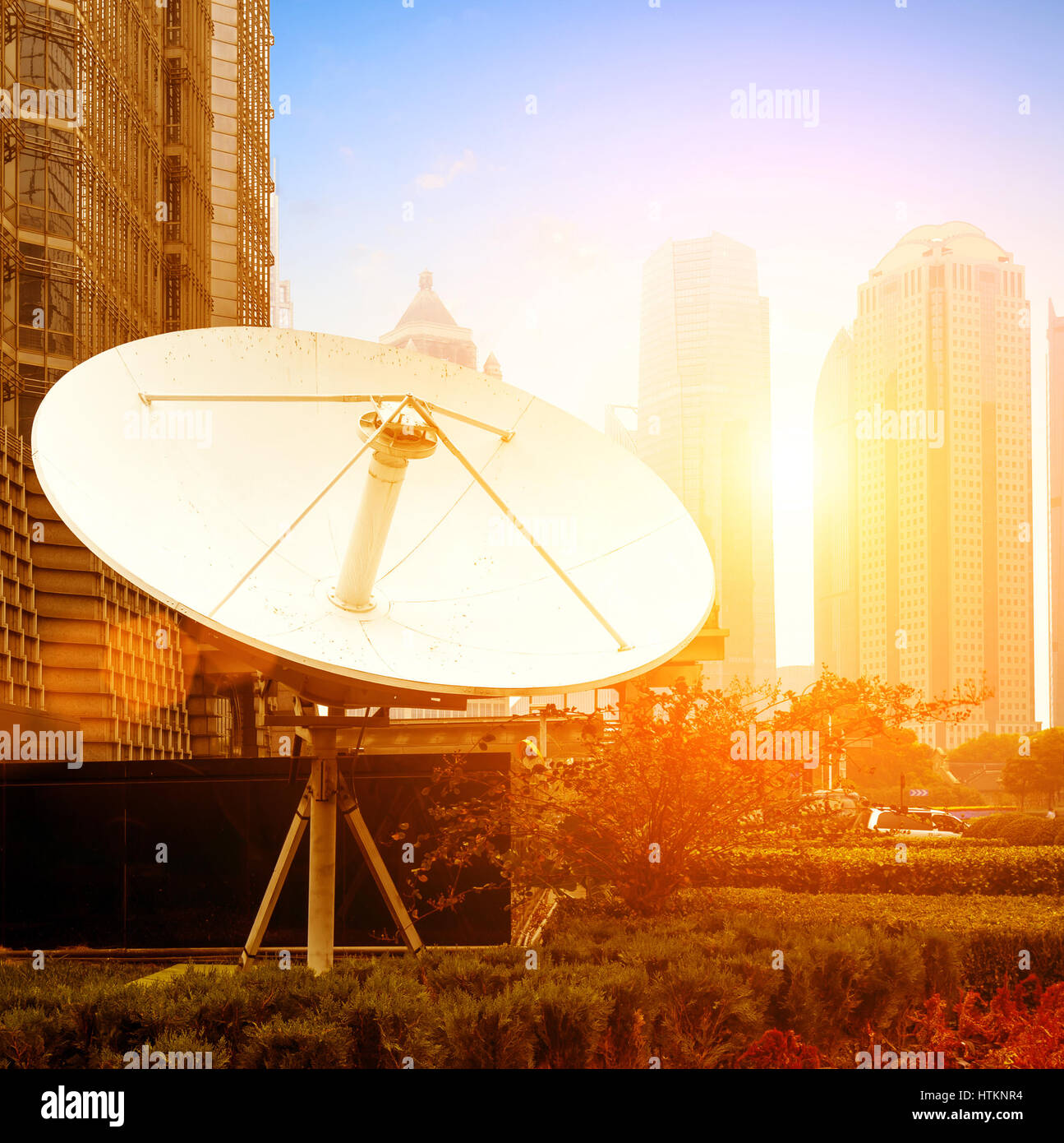 Satellite antenna dusk background Stock Photo - Alamy