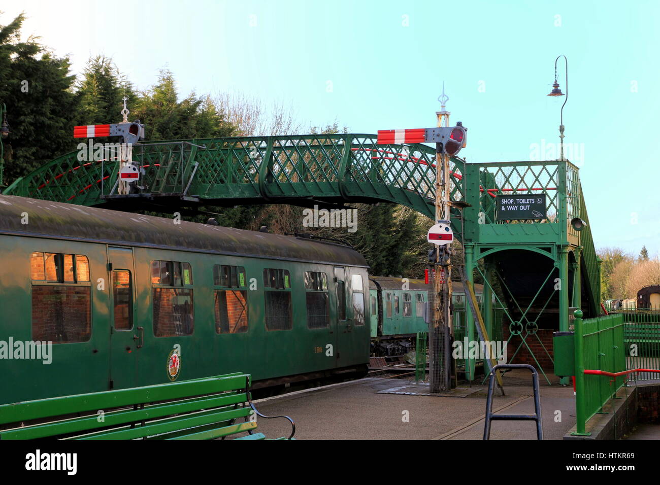 Alresford, UK - Jan 28 2017: Railway carriages, signals and footbridge ...