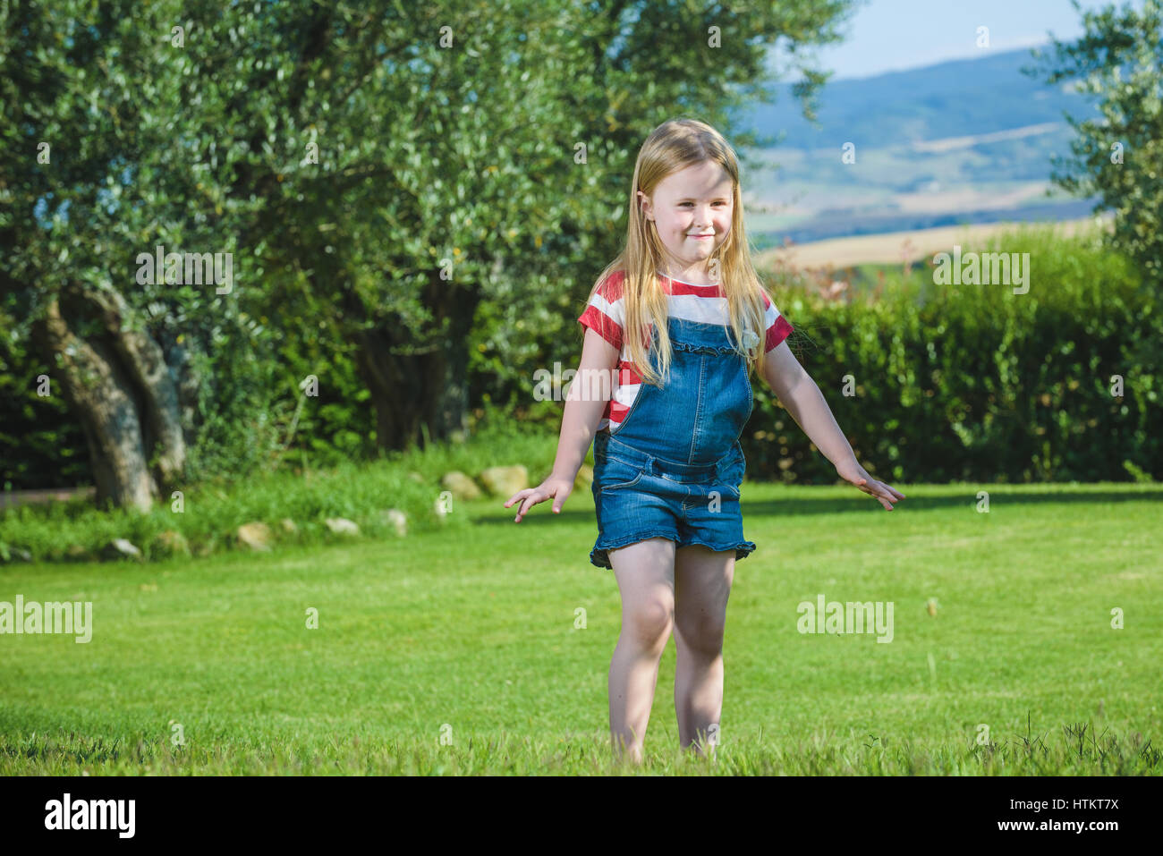 Children playing sun summer face hi-res stock photography and images ...