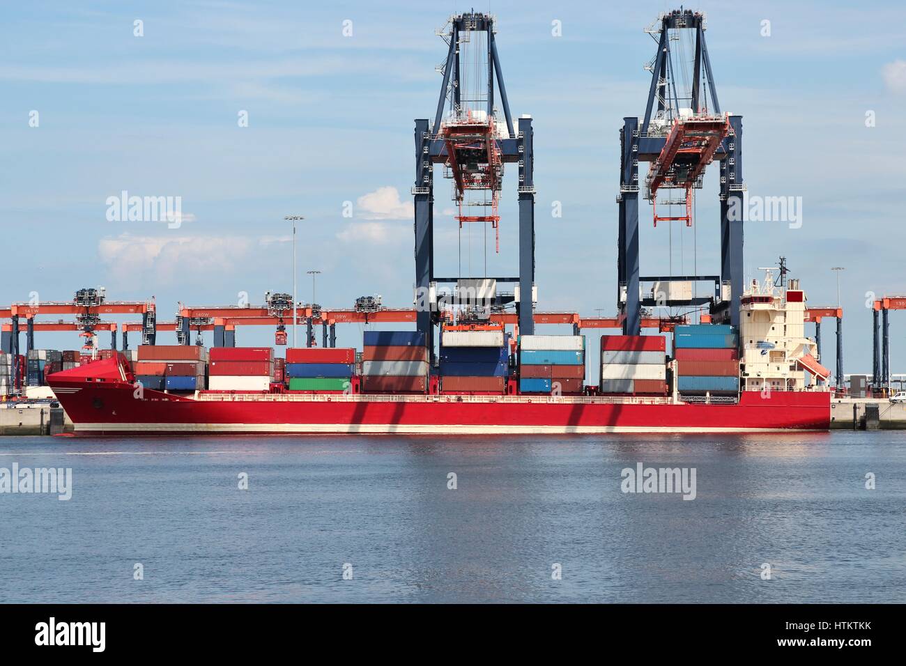 container ship at container terminal Stock Photo - Alamy