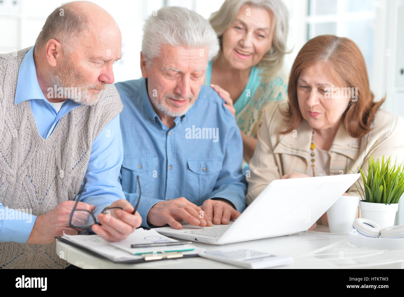Portrait of older people with a laptop Stock Photo - Alamy
