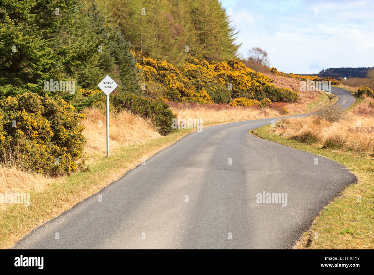 Passing place sign and pocket on rural single track scottish Highland ...