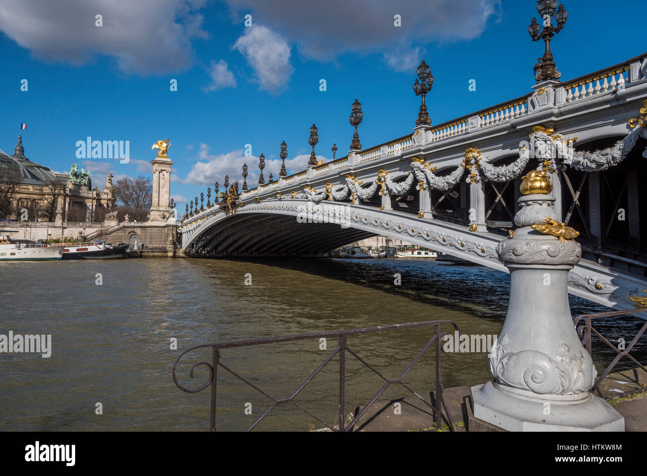 The Pont Alexandre III in Paris France as seen from the banks of the ...