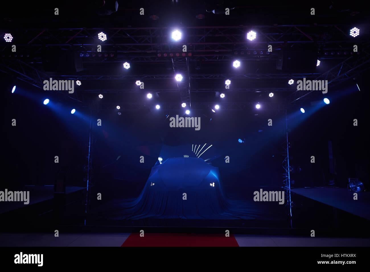 Close up of a new car hidden under cover Stock Photo - Alamy