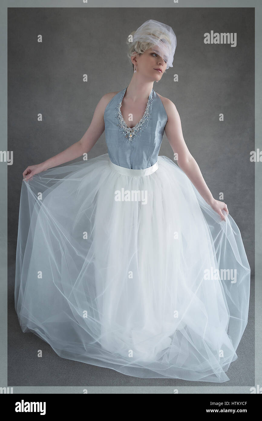 Blonde girl modeling a dress Stock Photo - Alamy