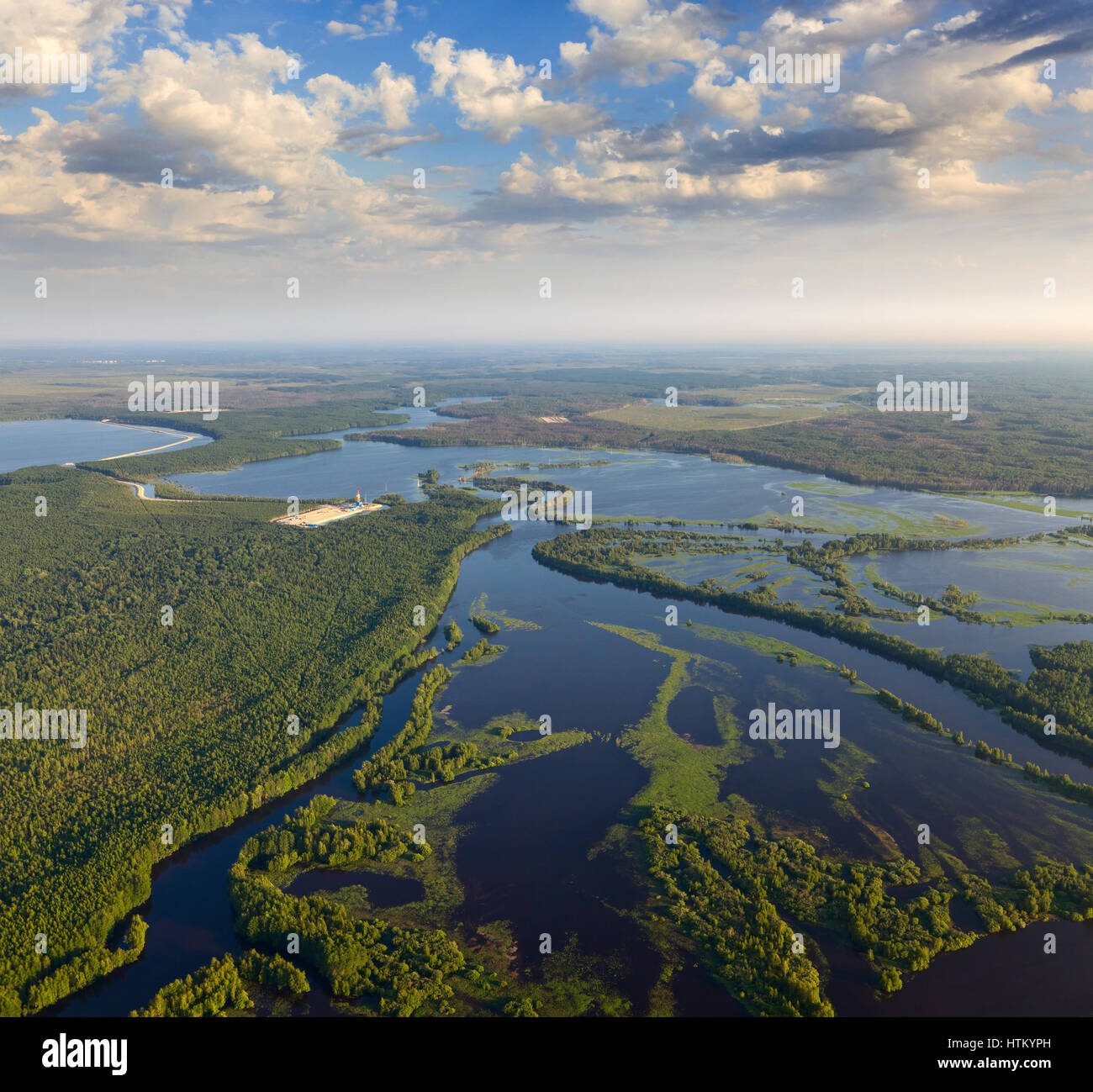 Forest river in flooding period, top view Stock Photo - Alamy
