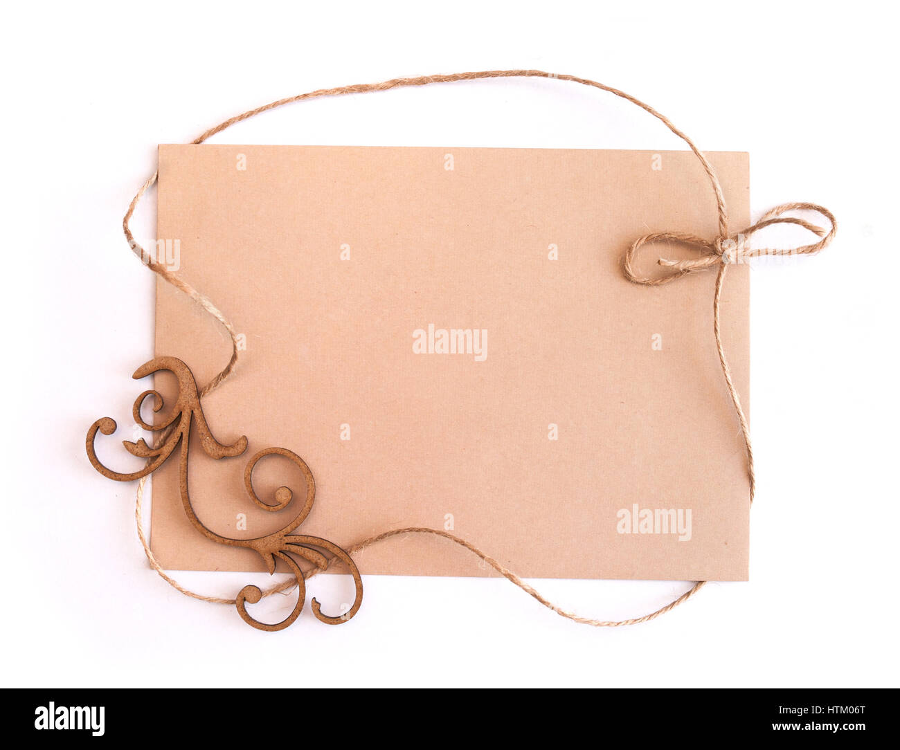 Sheet of kraft paper and a frame of linen thread and space for text ...