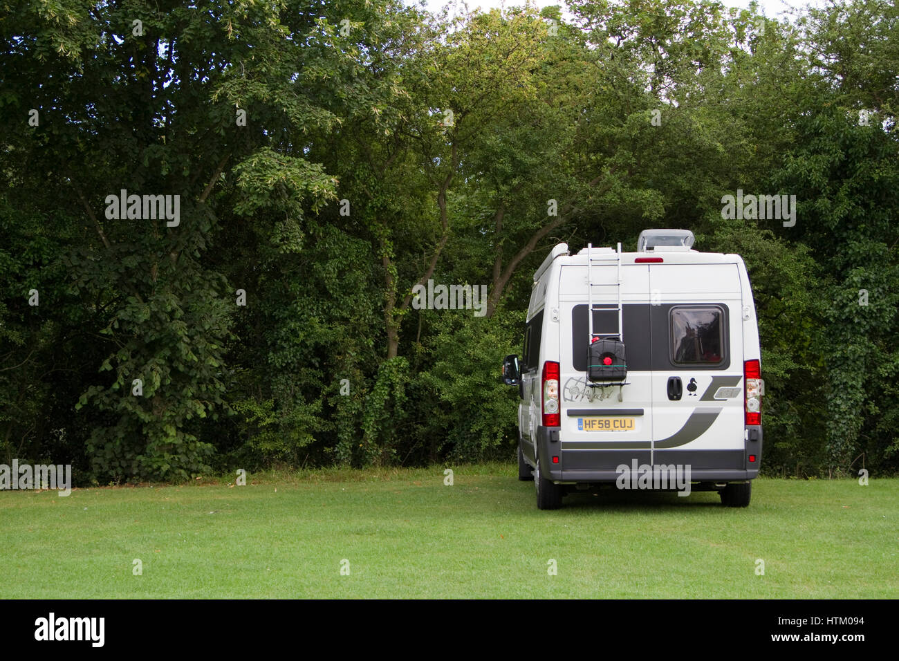 Rear view of camper van in a pleasant rural setting Stock Photo - Alamy