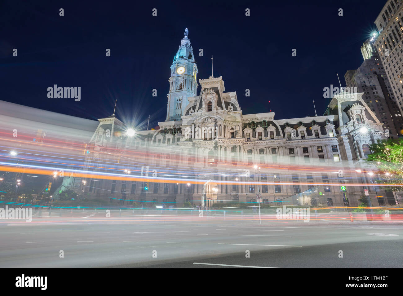 Philadelphia City Hall, at night with motion blur traffic, 1 Penn ...