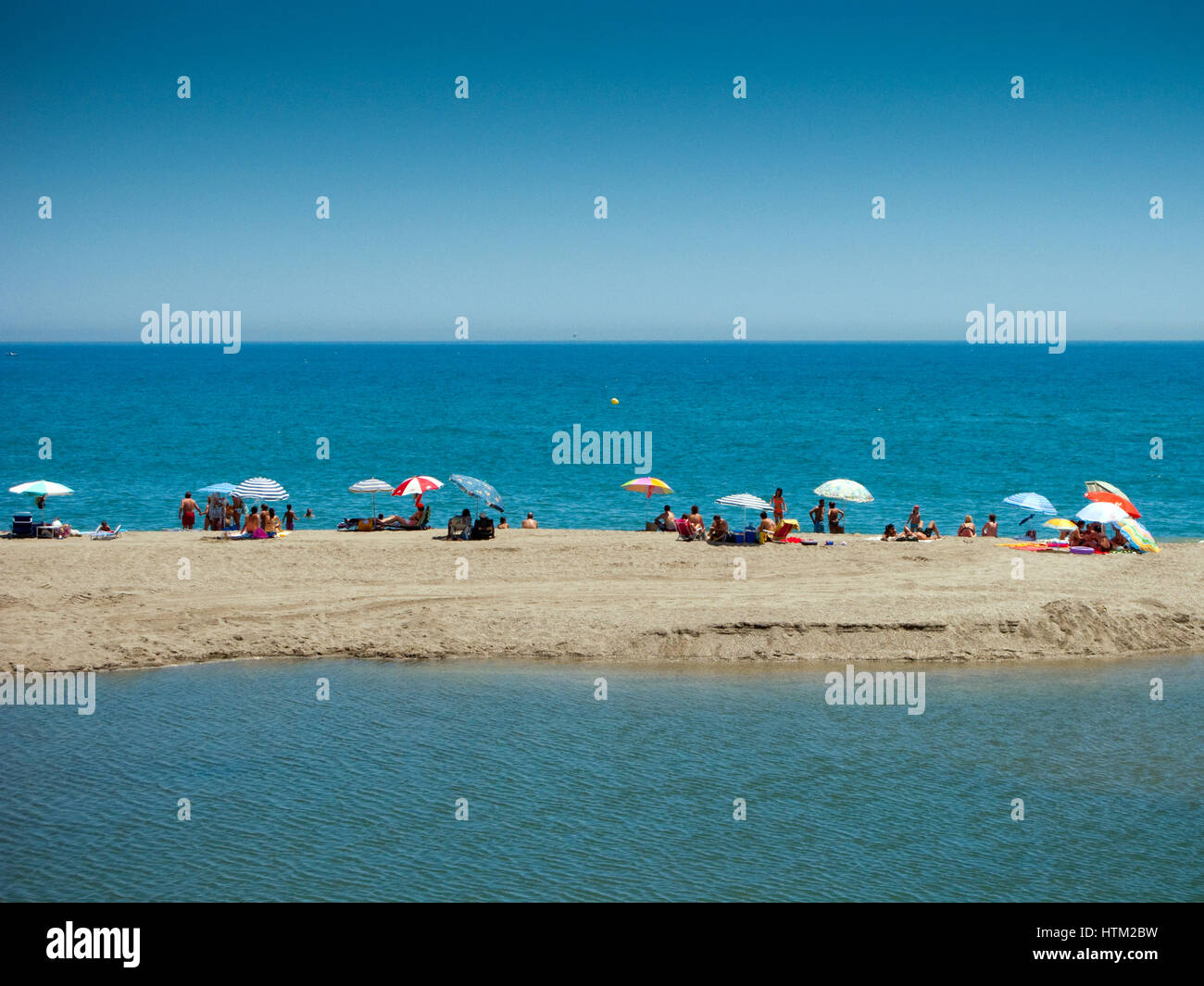 Holidaymakers sun sunshade hi-res stock photography and images - Alamy