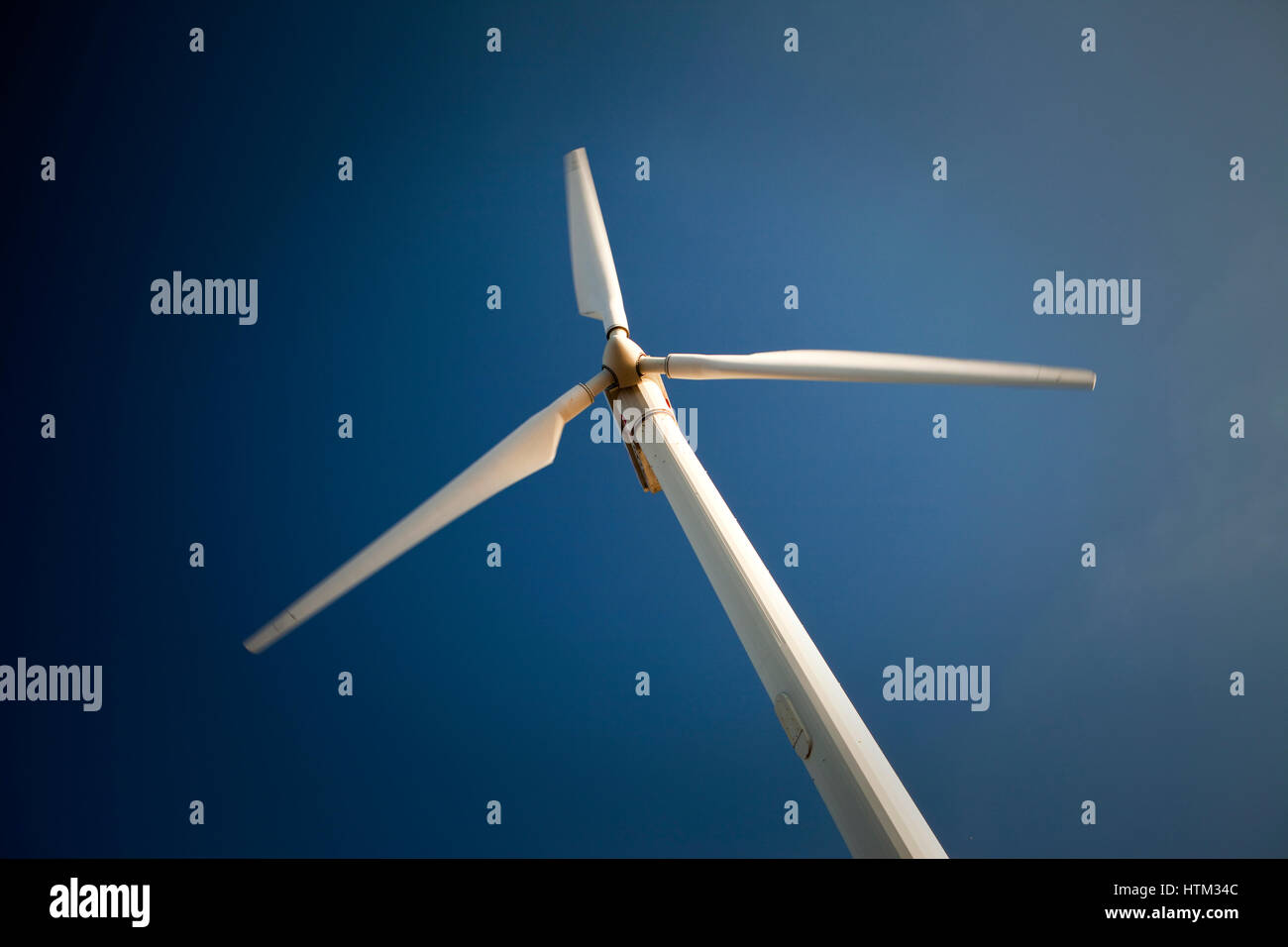 Modern Wind Turbine against blue sky Stock Photo - Alamy