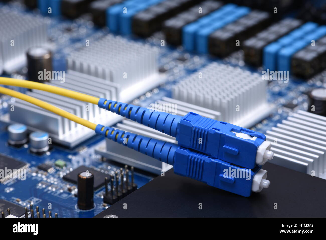 Technology Fiber Optic Cable on Motherboard Close-up Stock Photo - Alamy