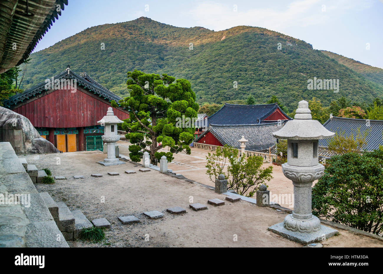 South Korea, Cheongnyong-dong, Busan, stone lanterns at the terraced ...