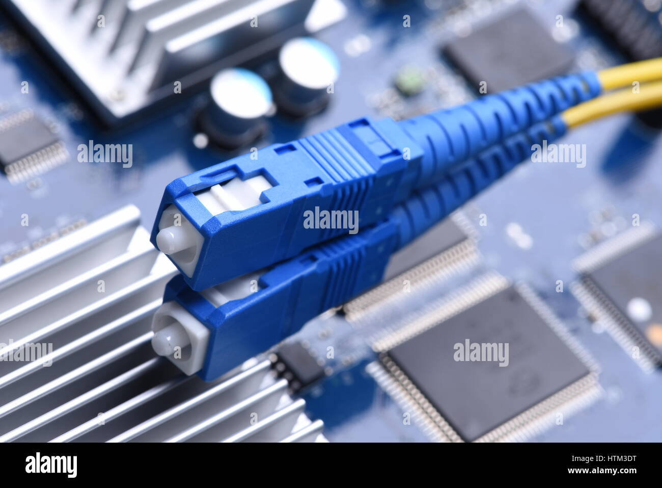 Technology Fiber Optic Cable on Motherboard Close-up Stock Photo - Alamy