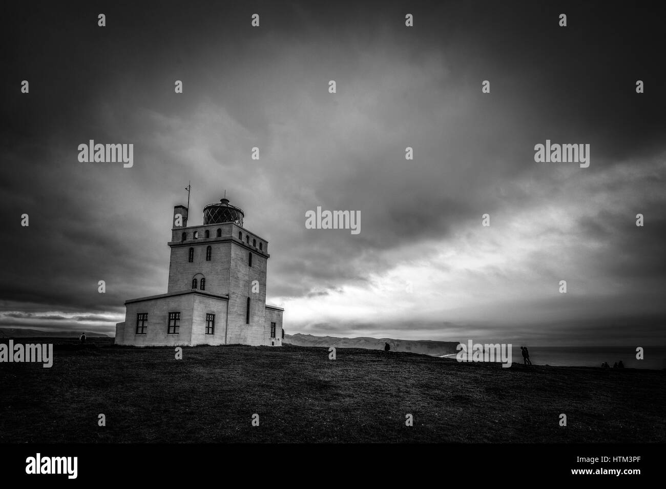An old lighthouse on the cliffs of Vik in Iceland Stock Photo - Alamy