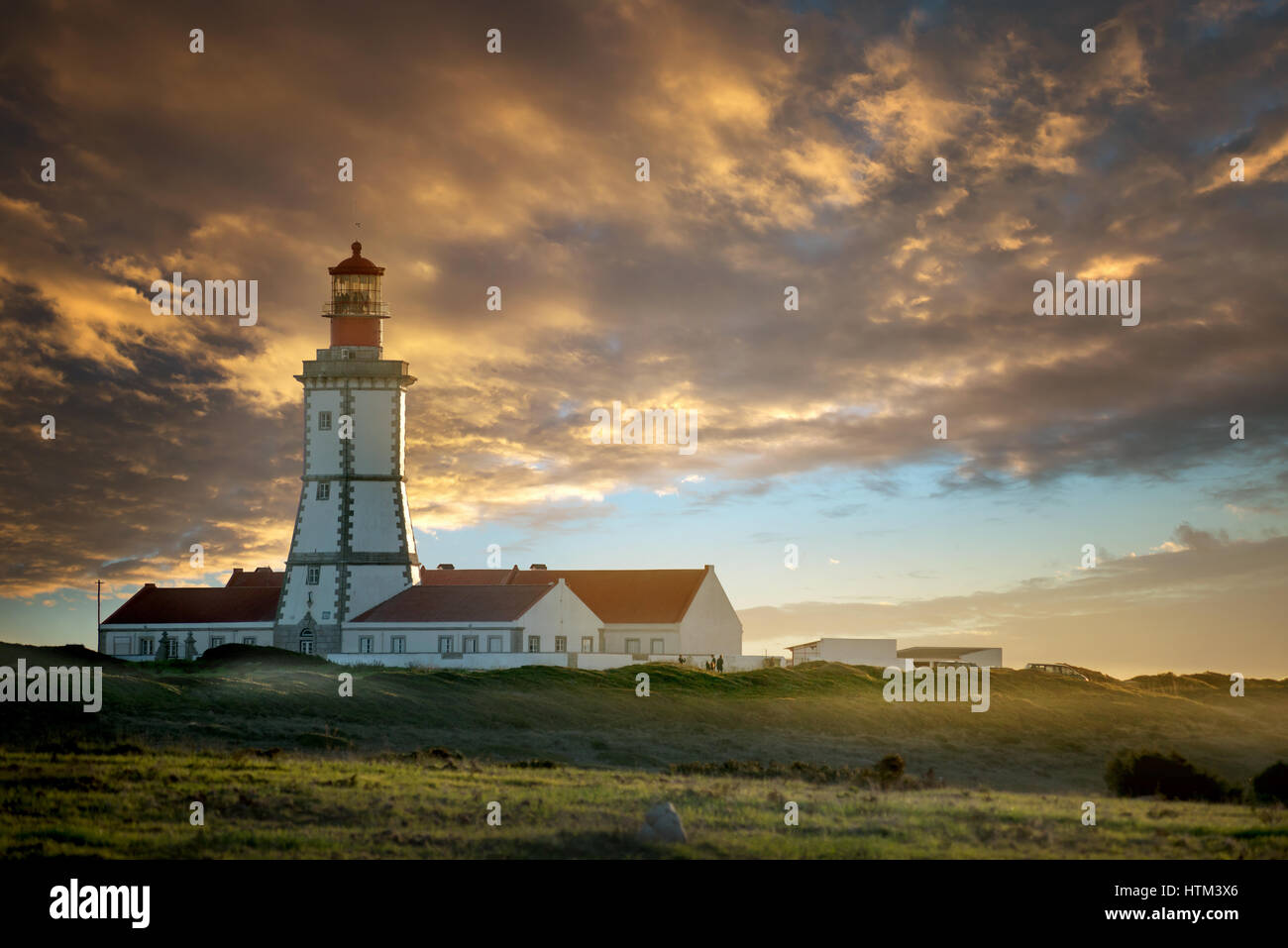 Beautiful Cabo Espichel lighthouse in Portugal, by sunset Stock Photo - Alamy