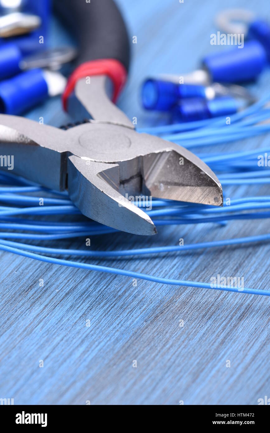 Electrical Tool and Wires on Metal Background Stock Photo - Alamy