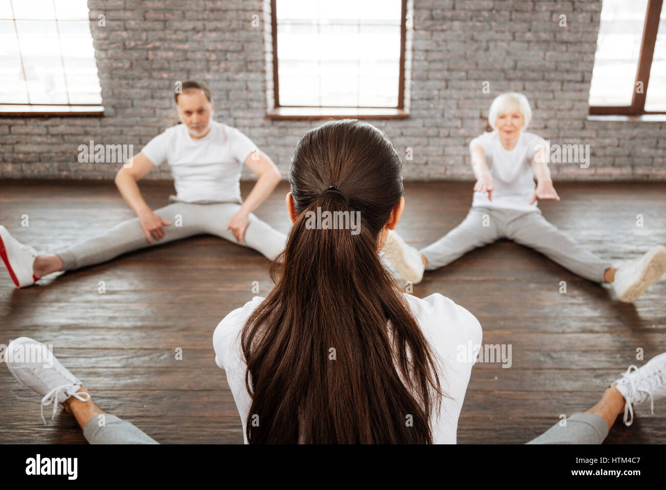 Group of elderly people doing exercises Stock Photo - Alamy
