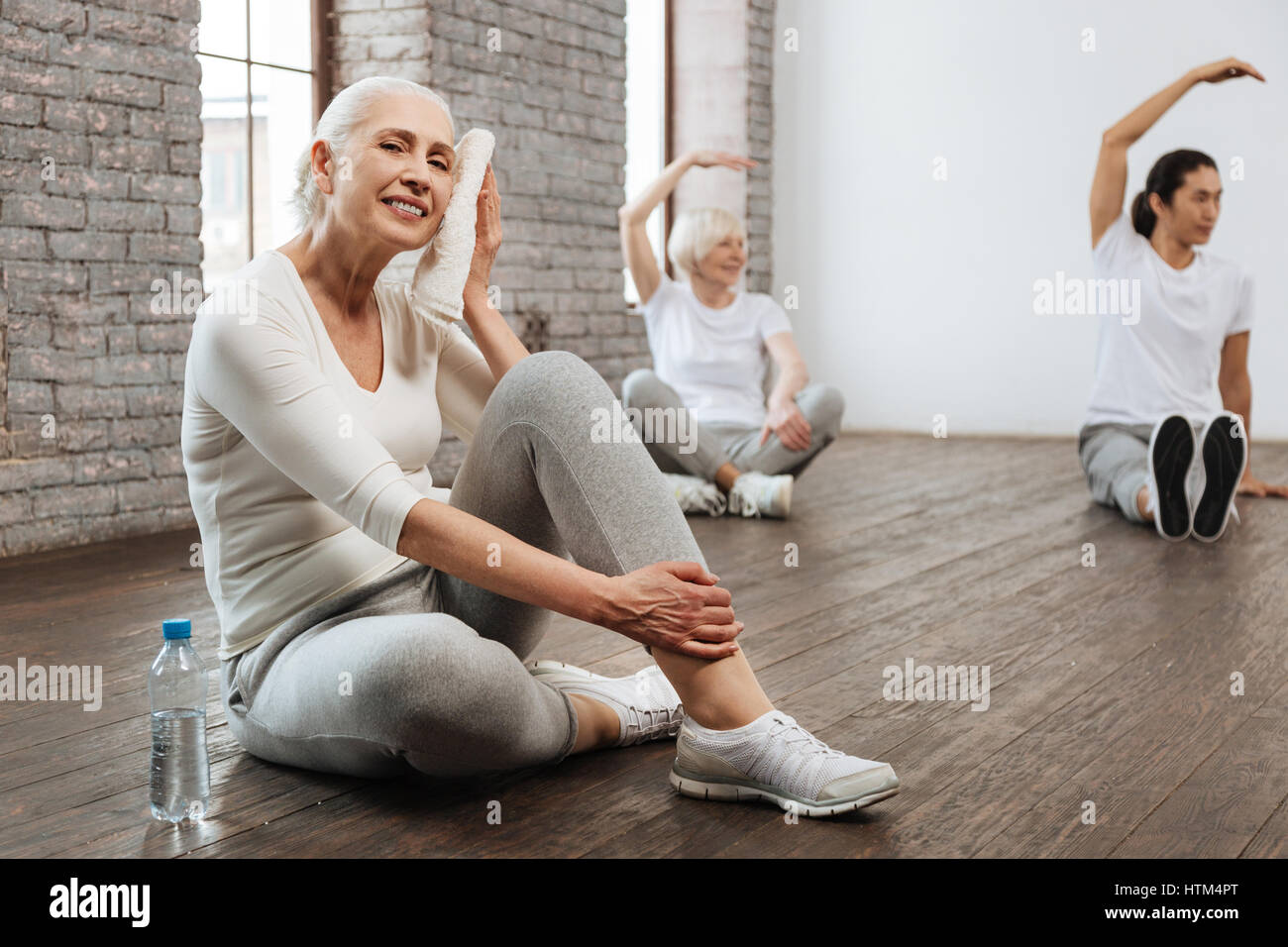 Touching his leg hi-res stock photography and images - Alamy