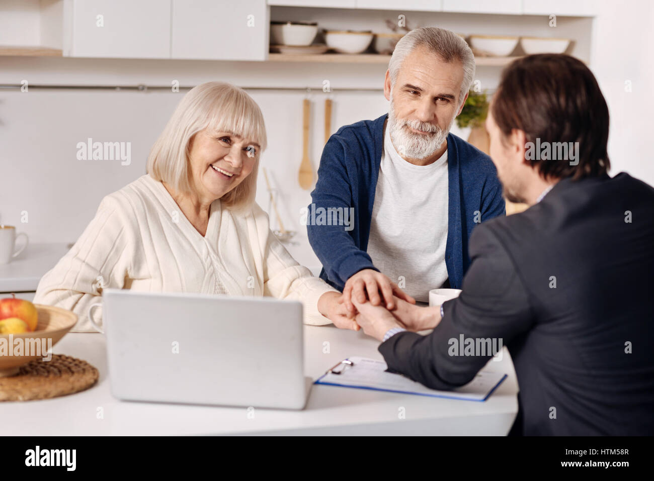 Elderly estate agent hi-res stock photography and images - Alamy