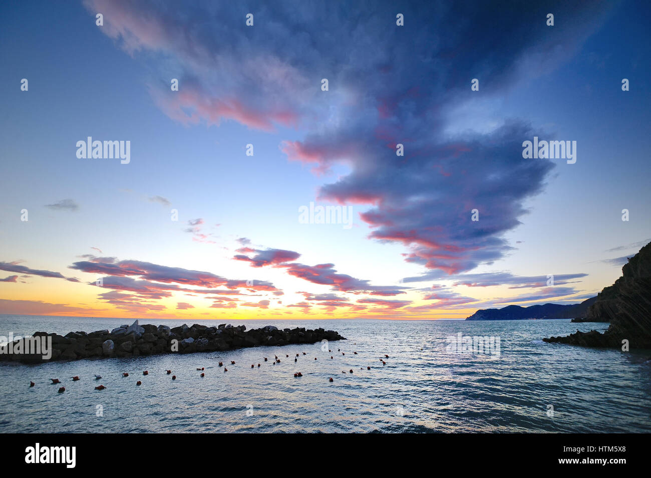 Sunset scenic picturesque view with sea, sky and clouds Stock Photo - Alamy