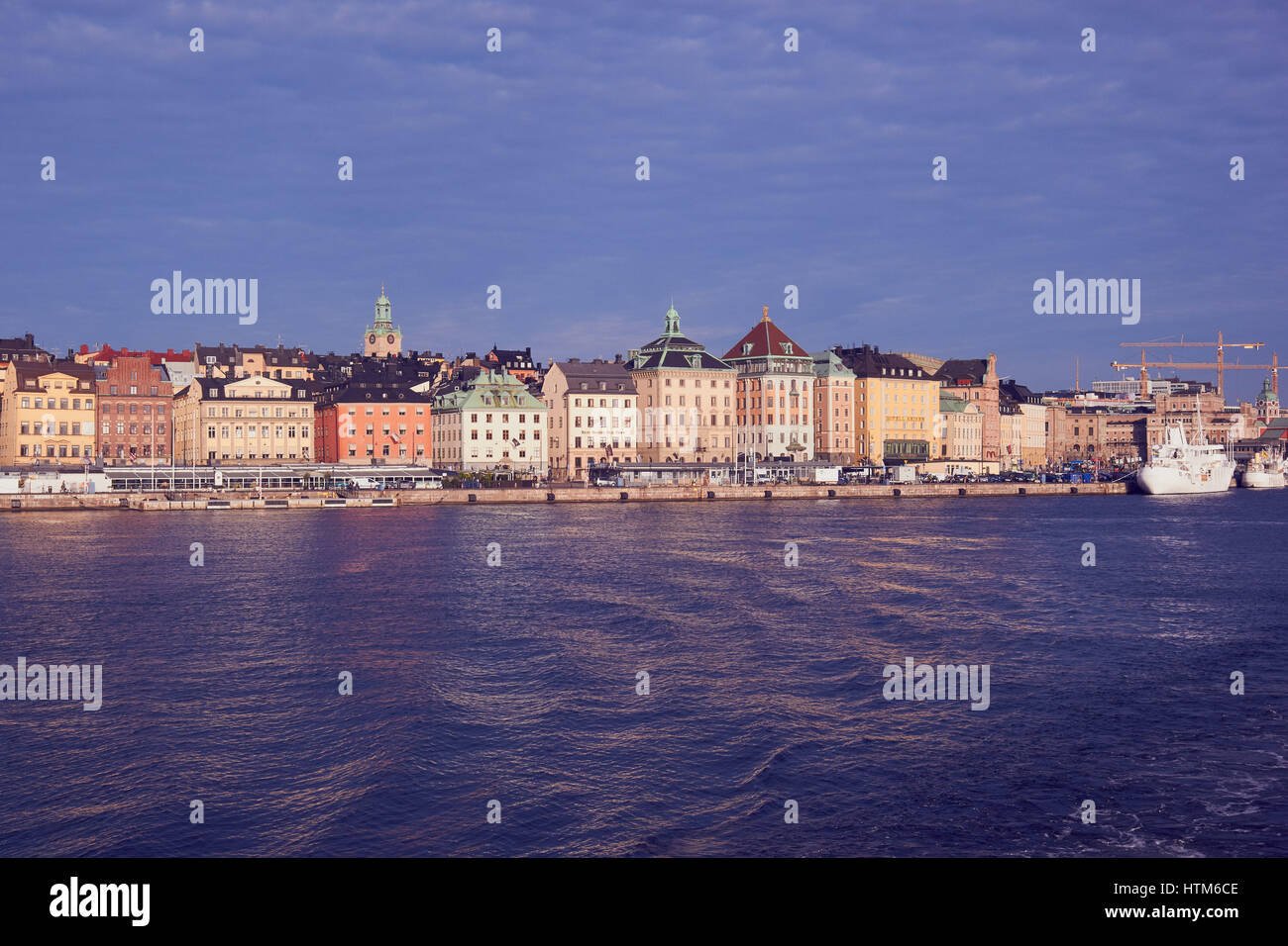 Gamla Stan waterfront from ferry at sunrise, Stockholm, Sweden ...