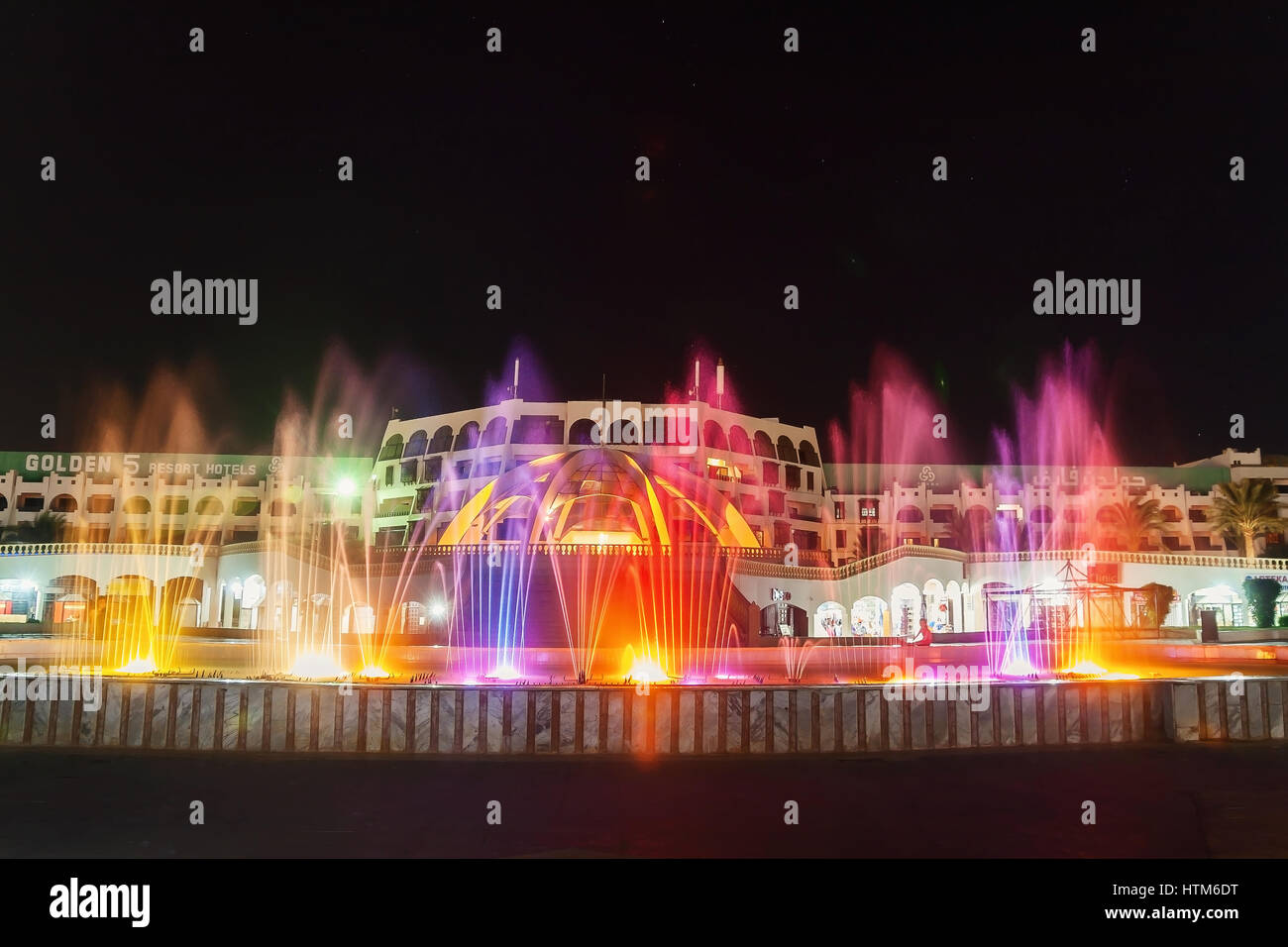The colorful of fountain on the lake at night. Egypt. Hurghada. Hotel ...