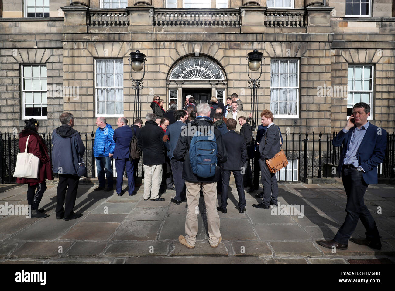 Members of the media wait outside Bute House, the Official Residence of ...