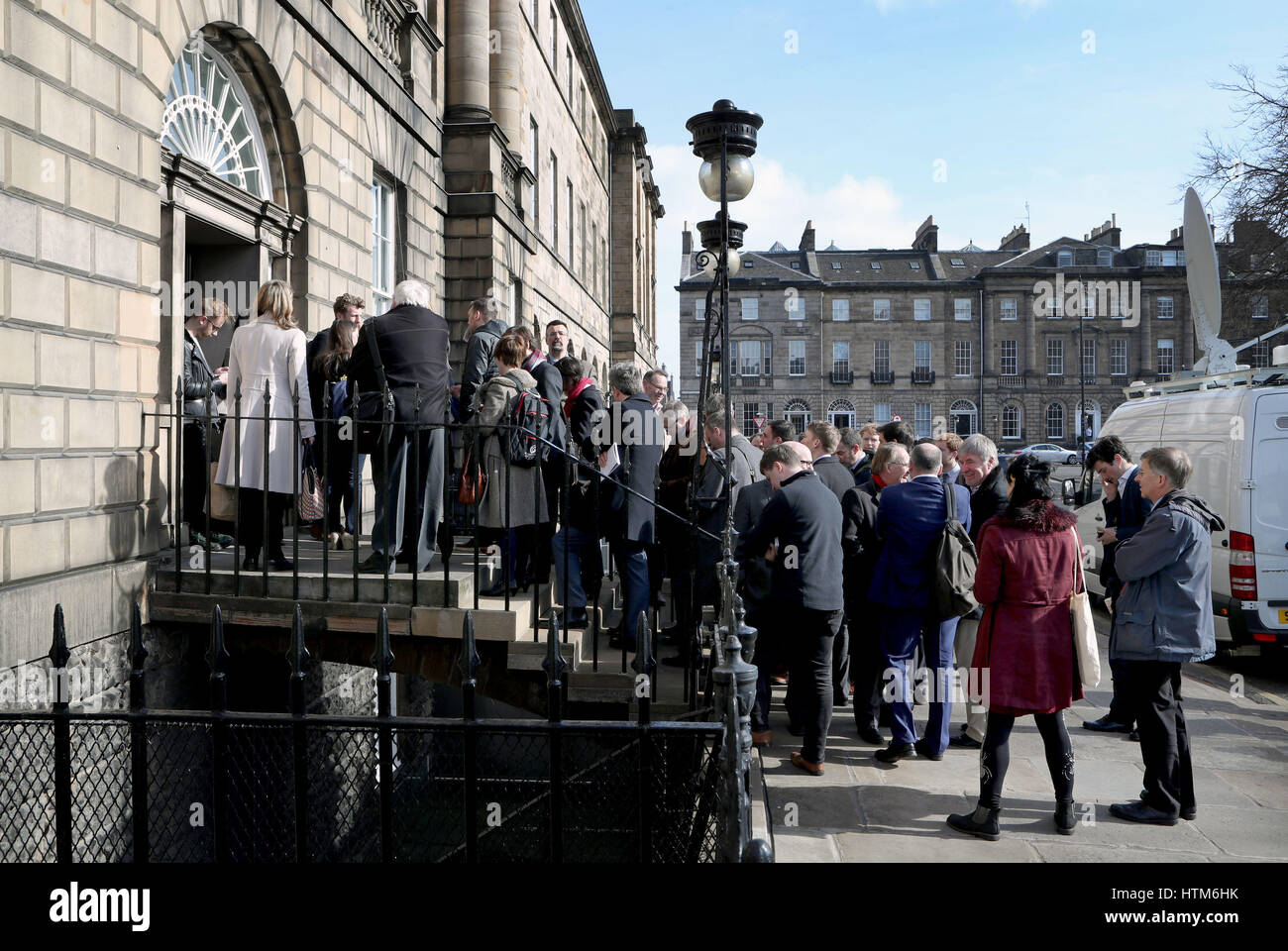 Members of the media wait outside Bute House, the Official Residence of ...