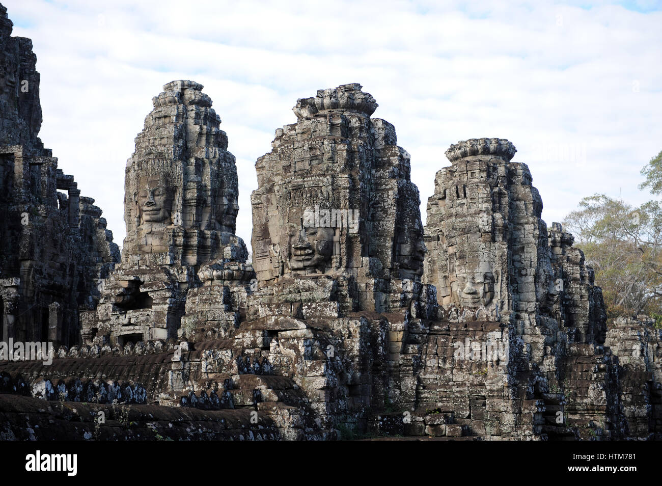 The Bayon Temple is known for its gigantic smiling stone faces on the ...