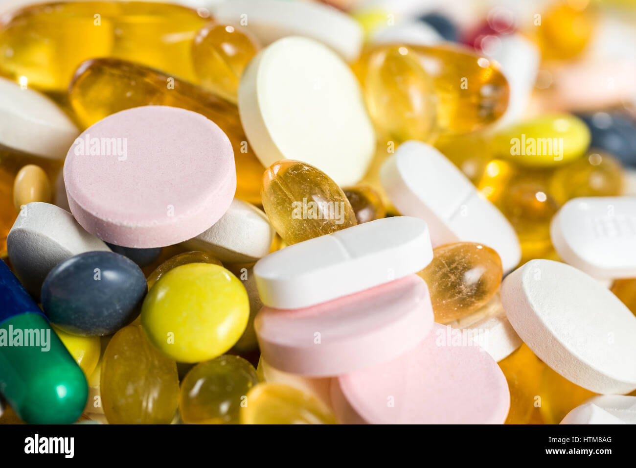 close-up medicinal drugs, pills and capsules in capsules and tablets on ...