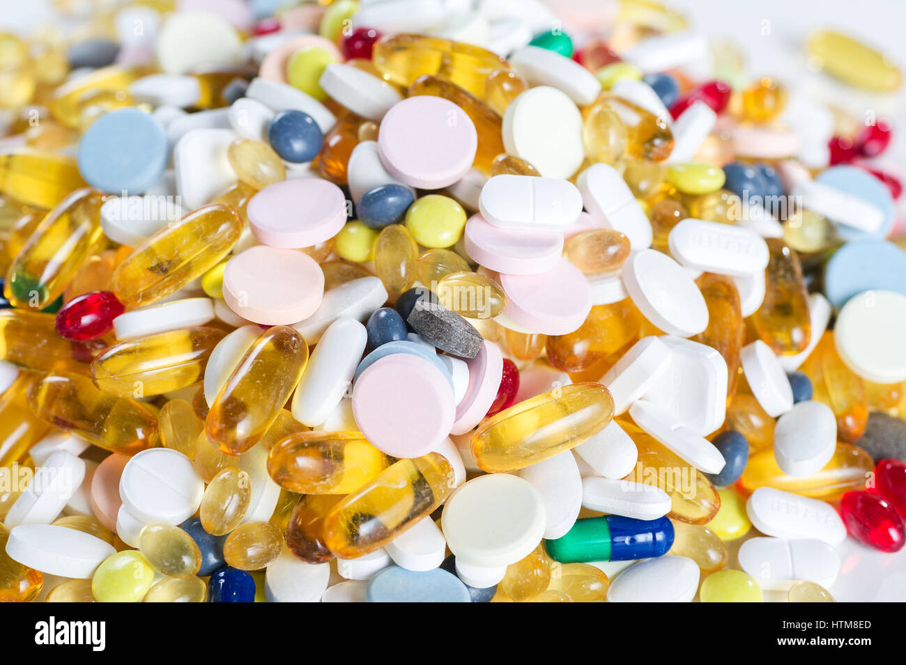 Many different colorful medication and pills from above isolated on ...