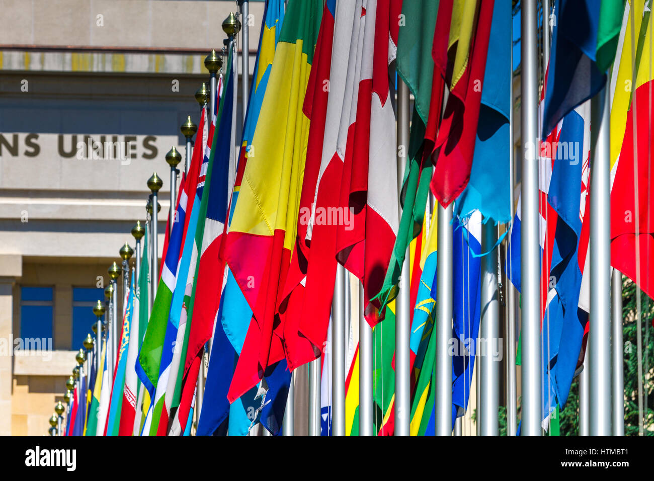 National flags at the entrance in UN office at Geneva, Switzerland ...