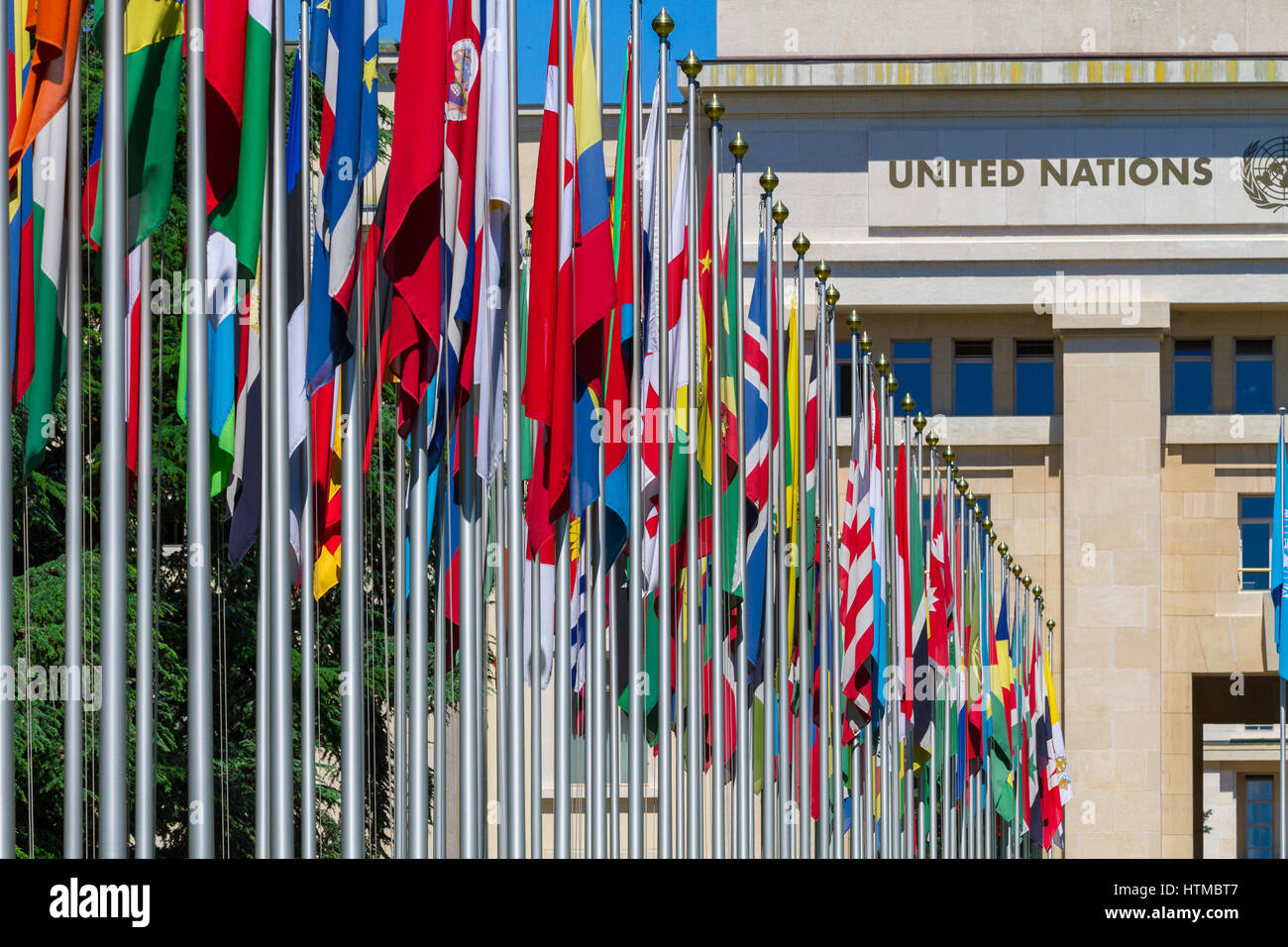 National flags at the entrance in UN office at Geneva, Switzerland ...