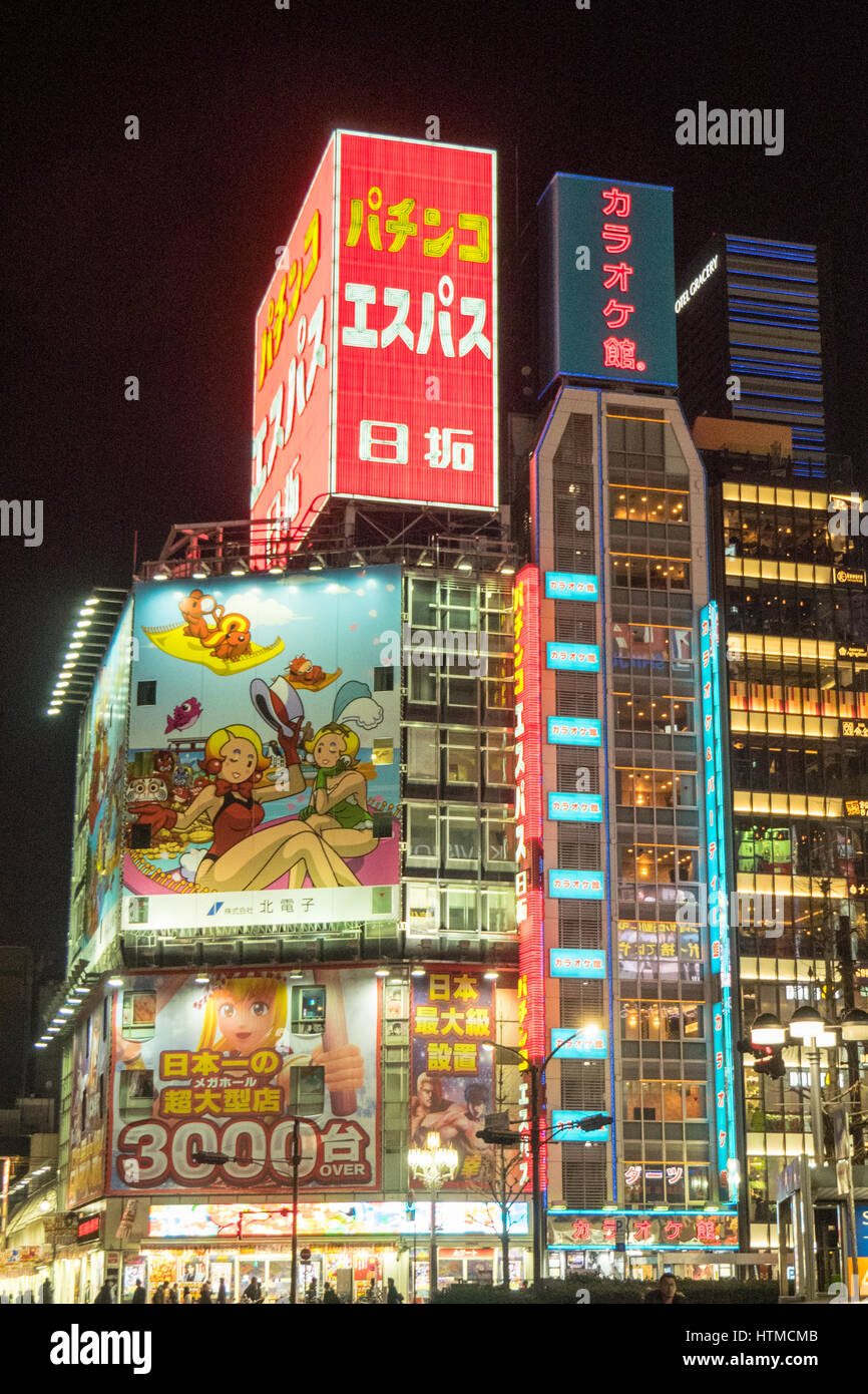 Bright colourful lights of commercial buildings at night in Shinjuku ...