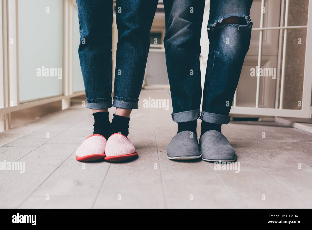 Woman wearing slippers hi-res stock photography and images - Alamy