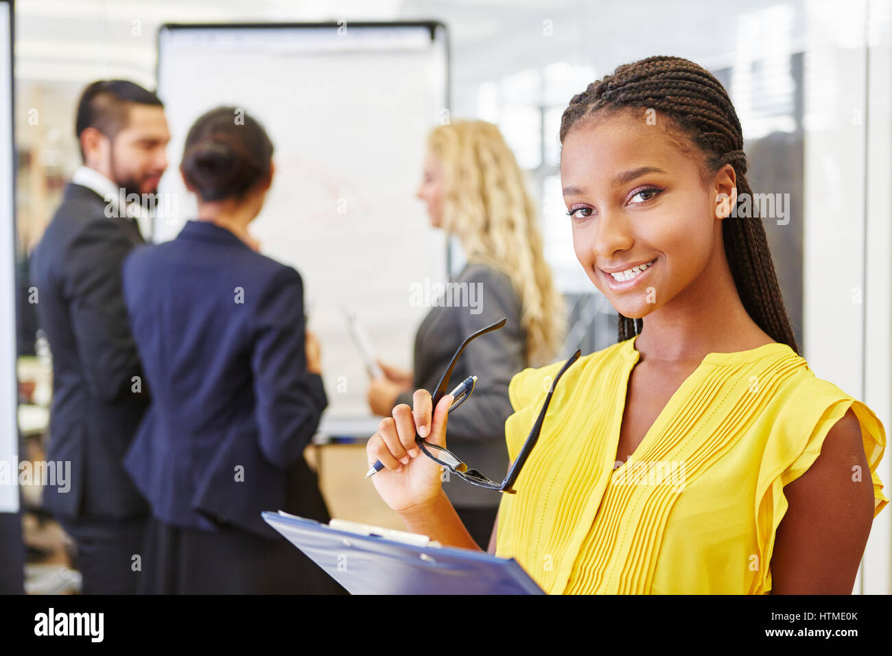 Student in interracial start-up team as intern in her internship Stock ...