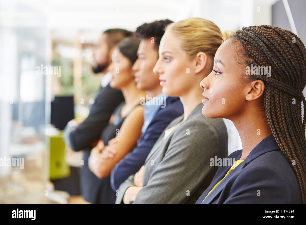 Young woman as trainee in business apprenticeship Stock Photo - Alamy